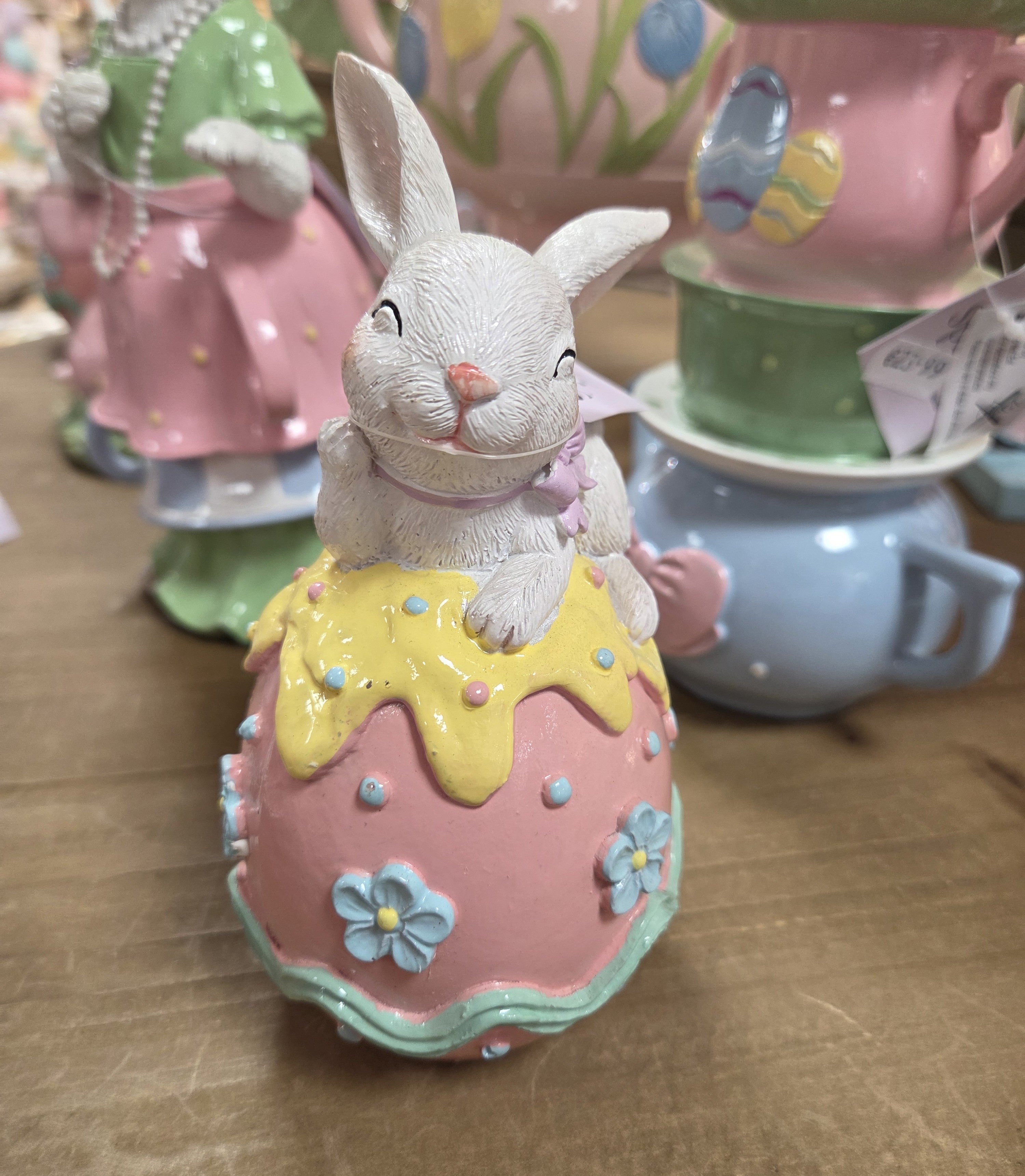 Rabbit Resting on Pink Egg
